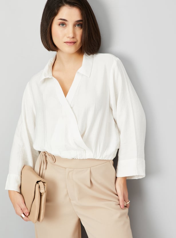 Buy Women Solid Surplice Neck Top Online at just Rs. 799.0 ...