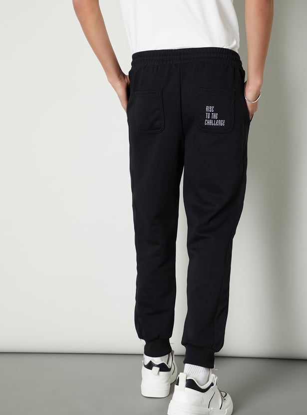 Buy Men Text Embroidered Sports Joggers Online at just Rs. 1399.0 ...