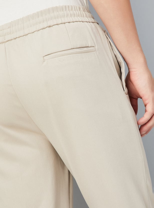 Buy Men Textured Slim Fit Formal Trousers Online at just Rs. 1499.0 ...