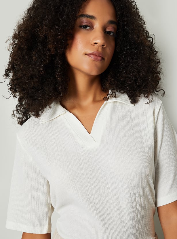 Buy Women Textured Polo T-shirt Online at just Rs. 599.0 ...