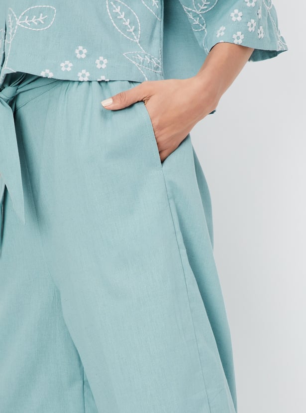 Buy Women Solid Tie-Up Waist Palazzos Online at just Rs. 899.0 ...