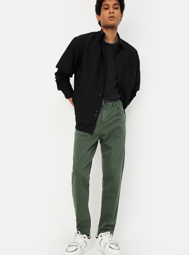 Buy Men Carrot Fit Solid Jeans Online at just Rs. 1299.0 ...